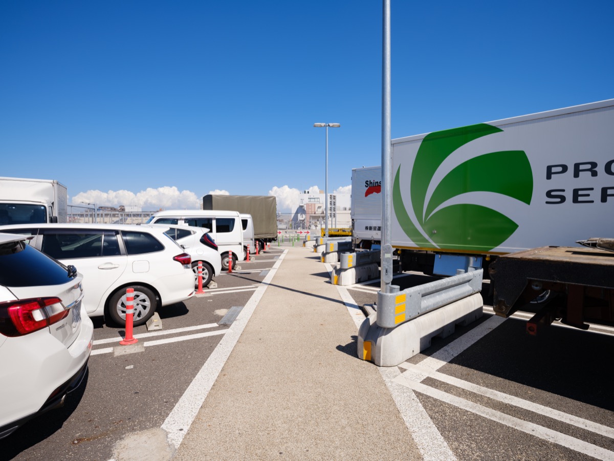 Daytime Parking with Trucks and Cars | Portfolio Gallery